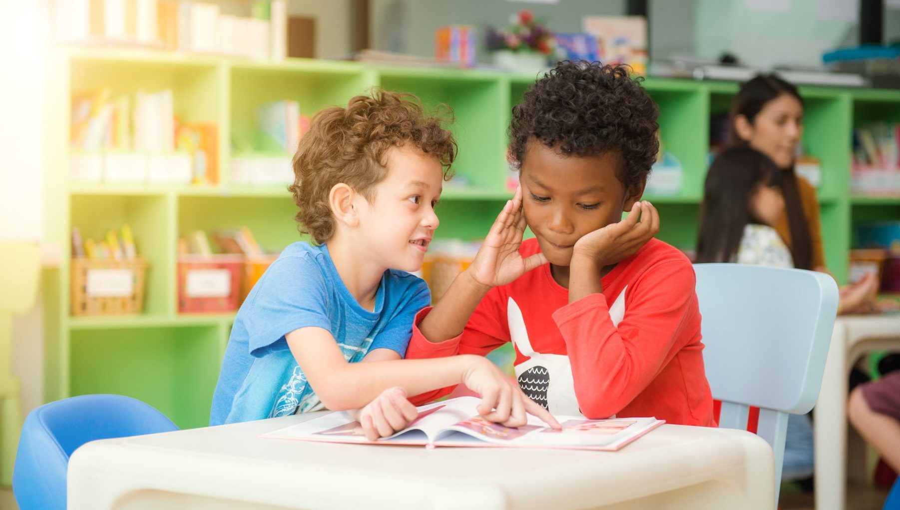cropped-cropped-row-of-multiethnic-elementary-students-reading-book-in ...